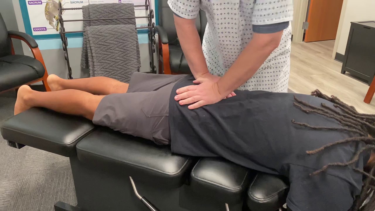 Spinal adjustment with drop table - prone - YouTube