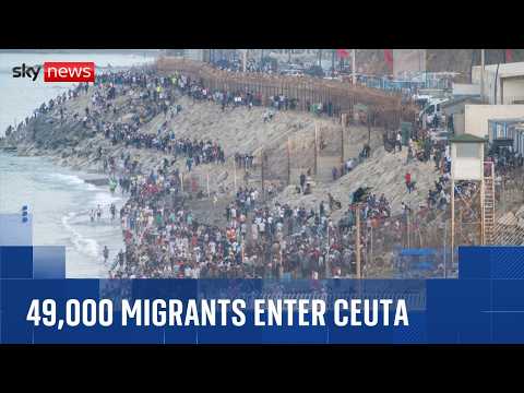 18 dead as almost 50,000 migrants enter Spanish enclave from Morocco