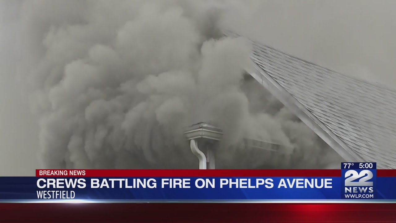 Firefighters work to put out multi-family home fire in Westfield - YouTube