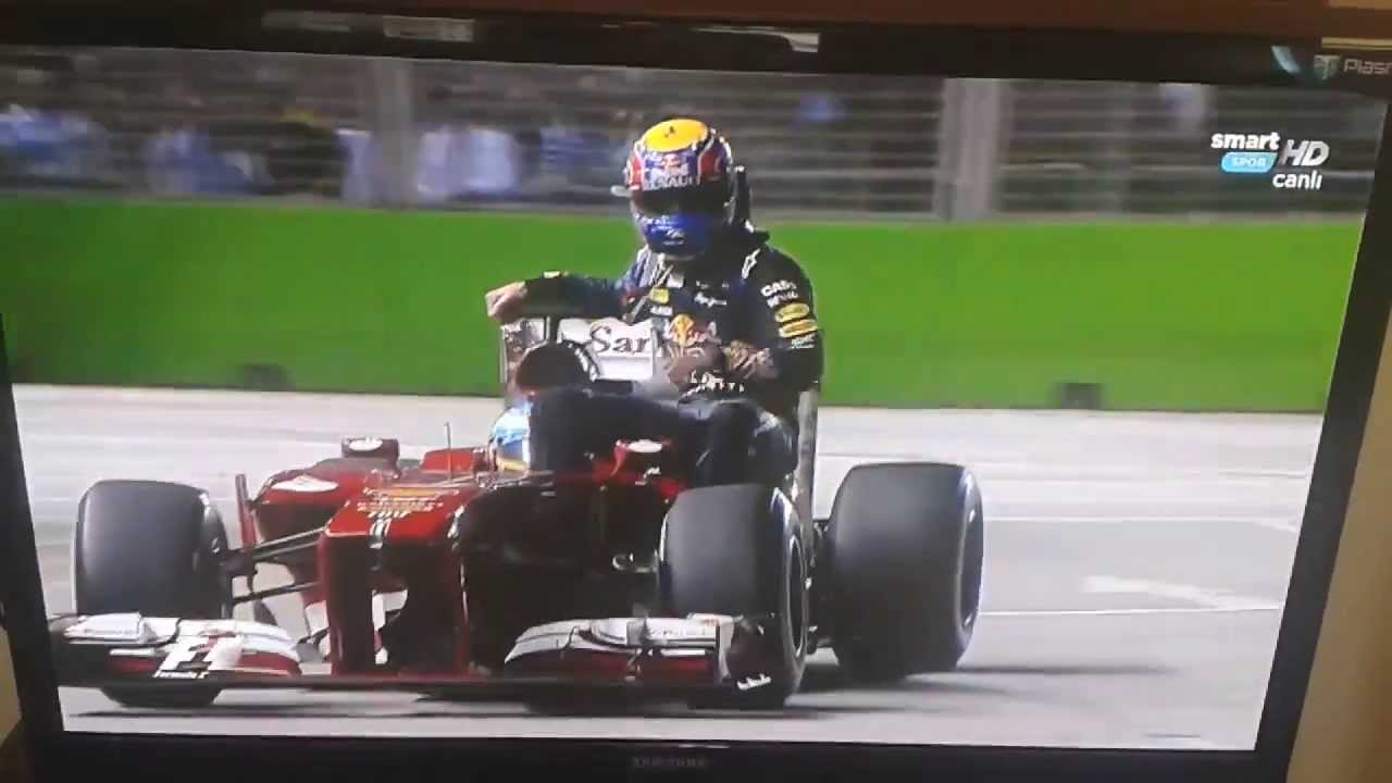 Mark Webber picks taxi ride in the Fernando Alonso Ferrari - YouTube