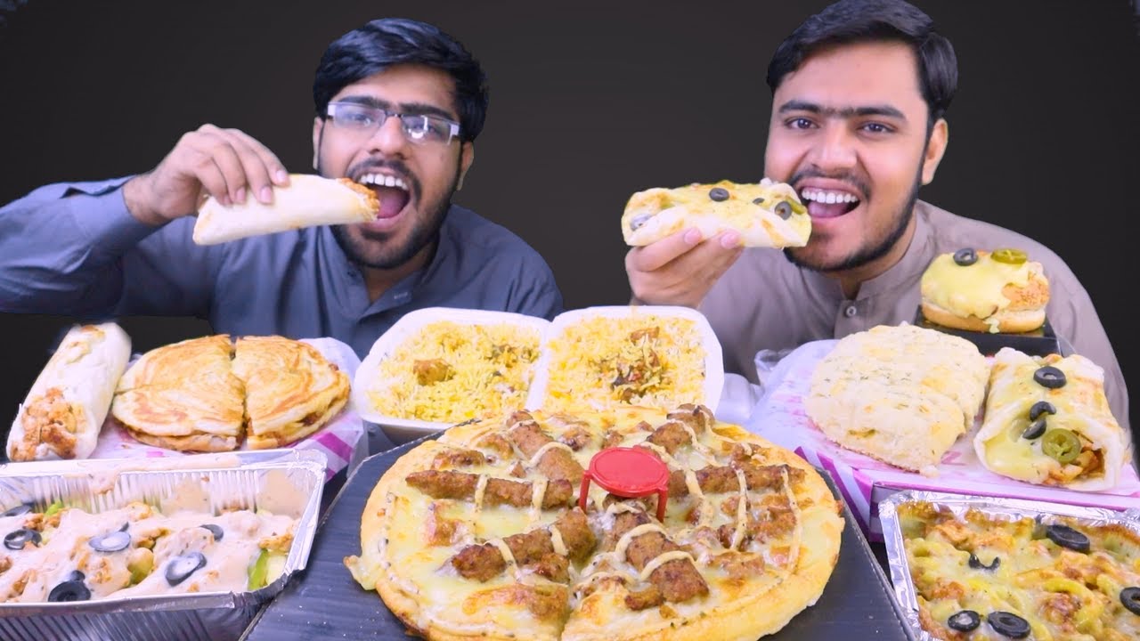 Eating Bihari Kabab Pizza, BBQ Toasties, Biryani, Dhurmat Roll, Pizza ...