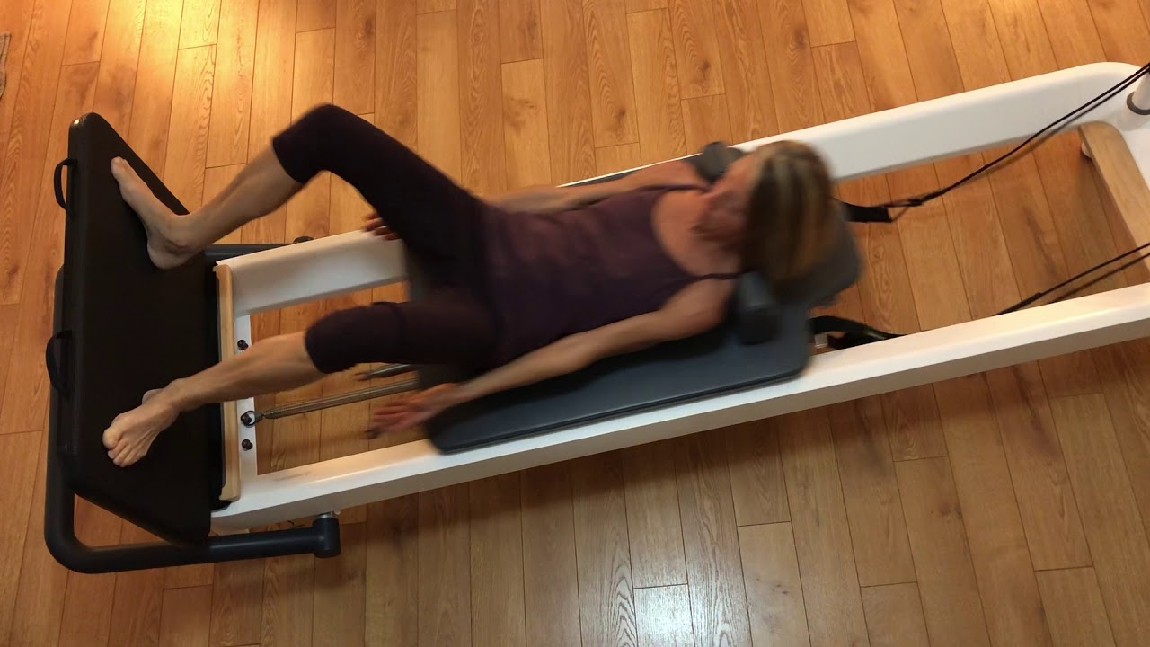 Second Position Jump on the Pilates Reformer - YouTube