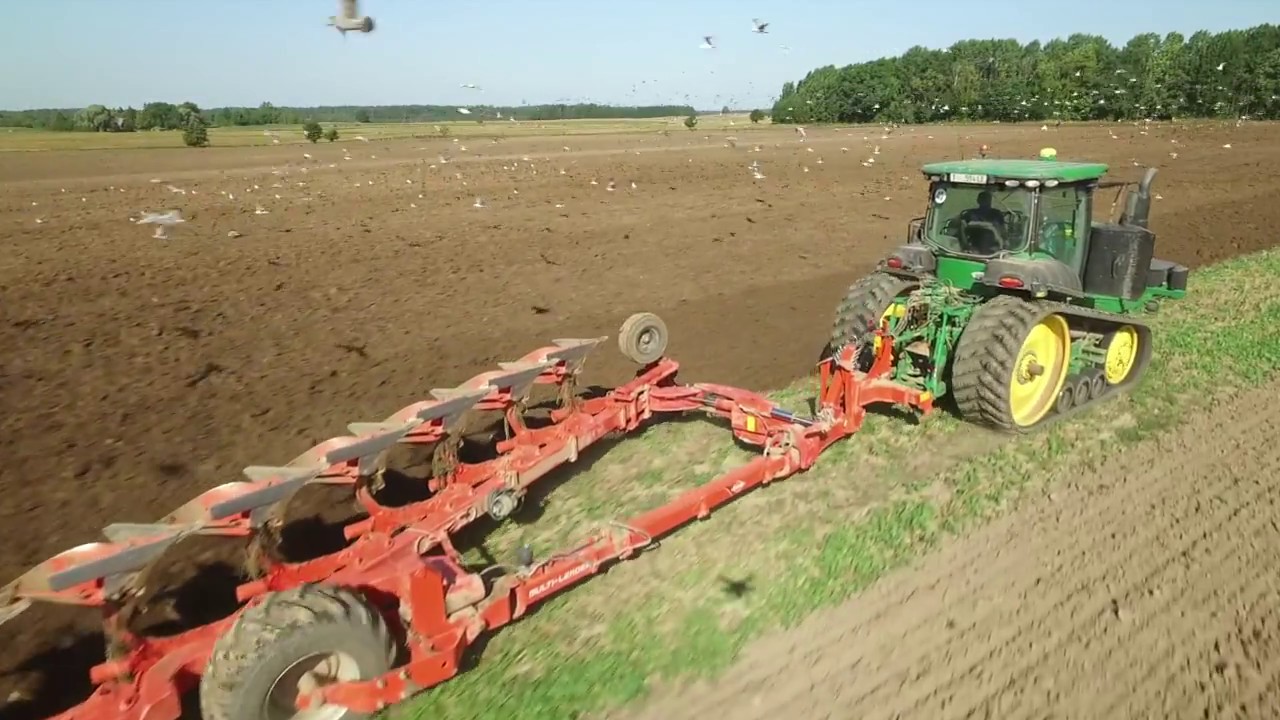 John Deere 8370RT & Kuhn Multileader Onland - YouTube