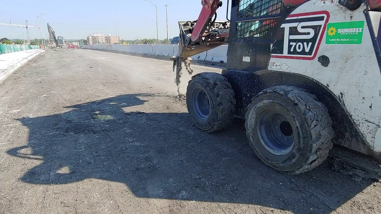 HHDW 360 scraper attachment for skid steer machines. - YouTube
