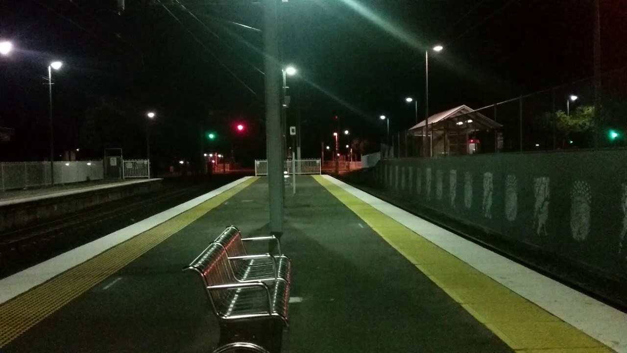 QR's 1754+2152 work a Northbound Railset thru Lawnton Station 01/11 ...