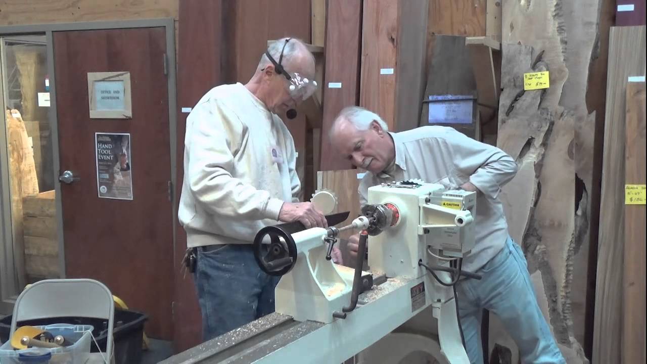 Fred Eklund turns a cup and ball game, a Christmas ornament, a top and ...