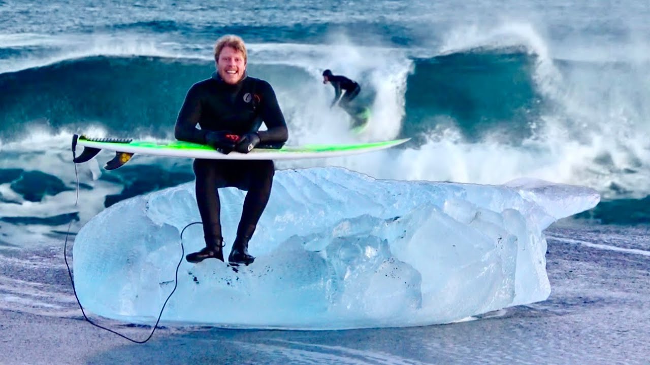 SURFING BIG WAVES BETWEEN GIANT ICEBERGS - YouTube