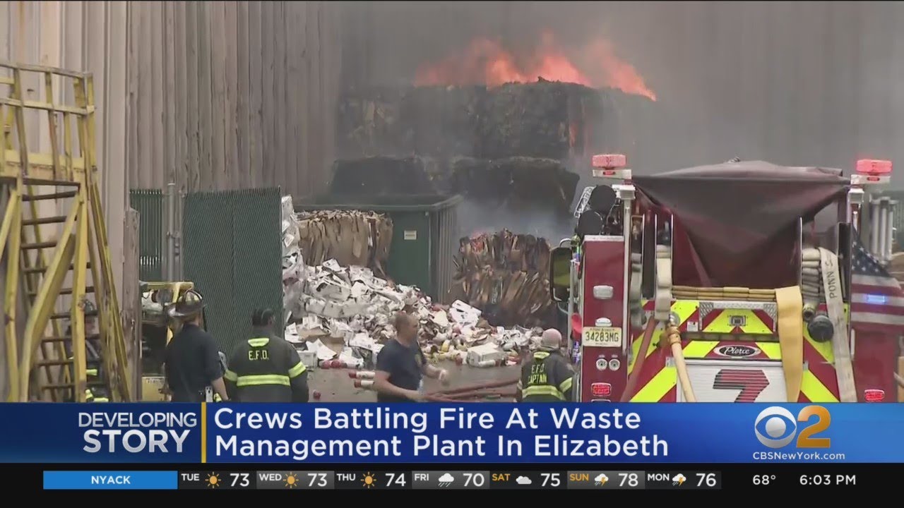 Crews battling fire at waste management plant in Elizabeth - YouTube