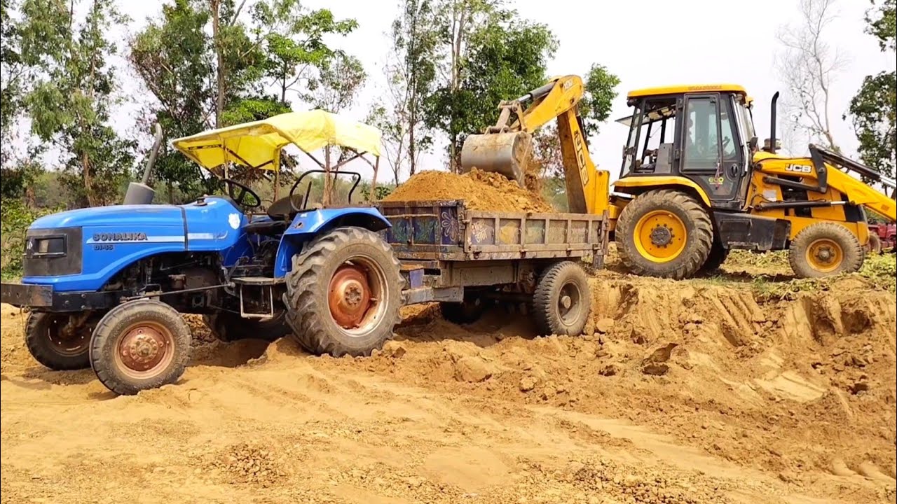 New Jcb 3dx Backhoe Loader Machine Loading Red Mud In Sonalika 35 Di ...