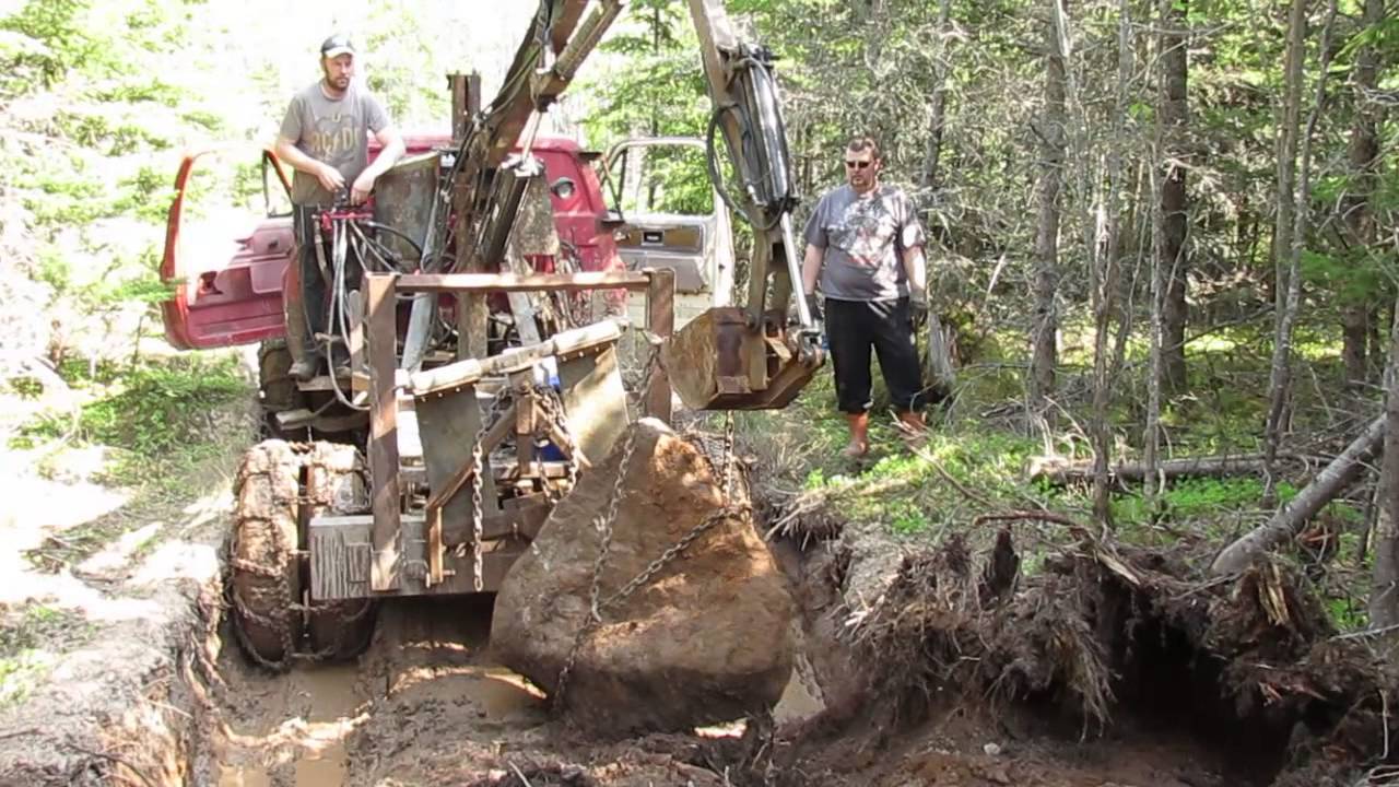 Stump & Rock Removing with The Swamp Thing - YouTube