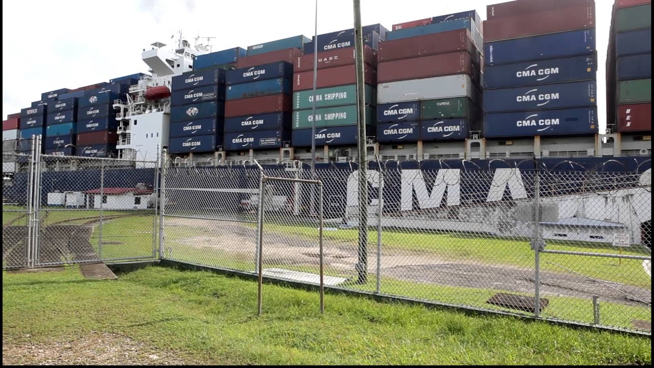 CMA CGM White Shark enters the Gatun Locks of the Panama Canal - YouTube
