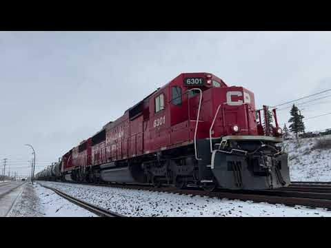 DUAL SD60's!!!! CP 6301 and CP 6257 lead CP C17 South at Manchester, Calgary, Alberta - YouTube
