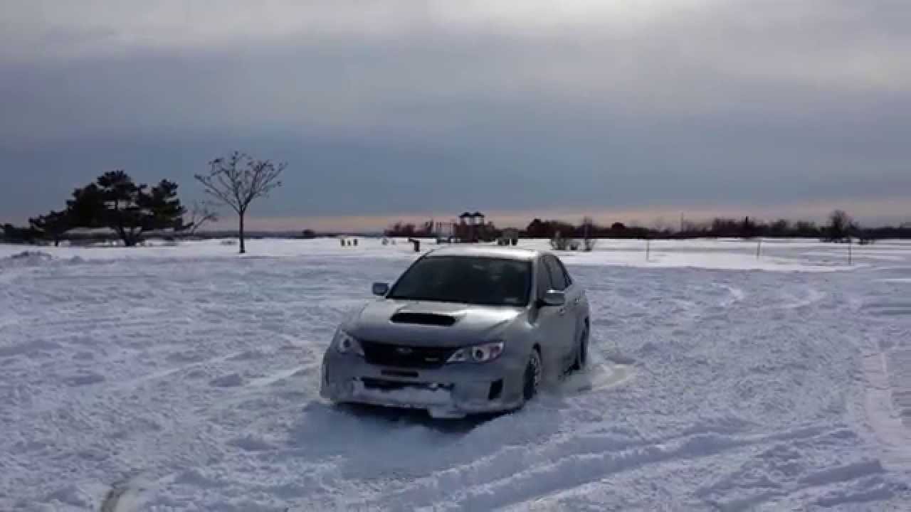 WRX in the snow with summer tires - YouTube