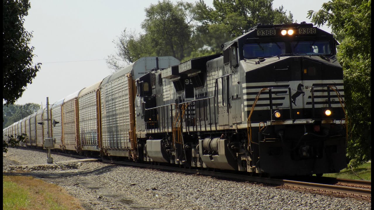 NS 9368 leads NS 288 north through Ossian - YouTube