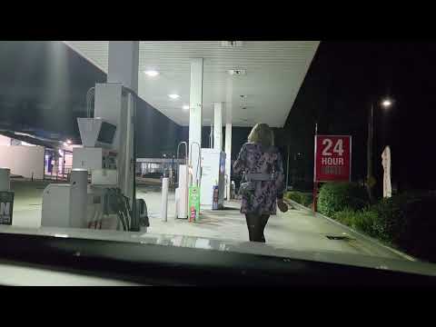 Blonde crossdresser trying (and failing) to buy gas. Needed to be caught by someone!