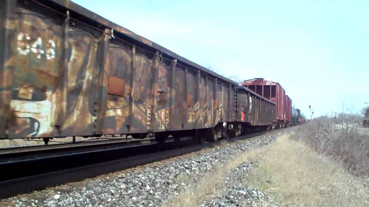 Fast CN Freight Train Passes Clear Signal - YouTube