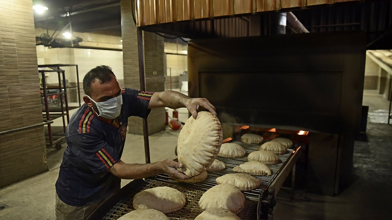 Syria: helping a bakery relight the ovens after the war | #shorts - YouTube