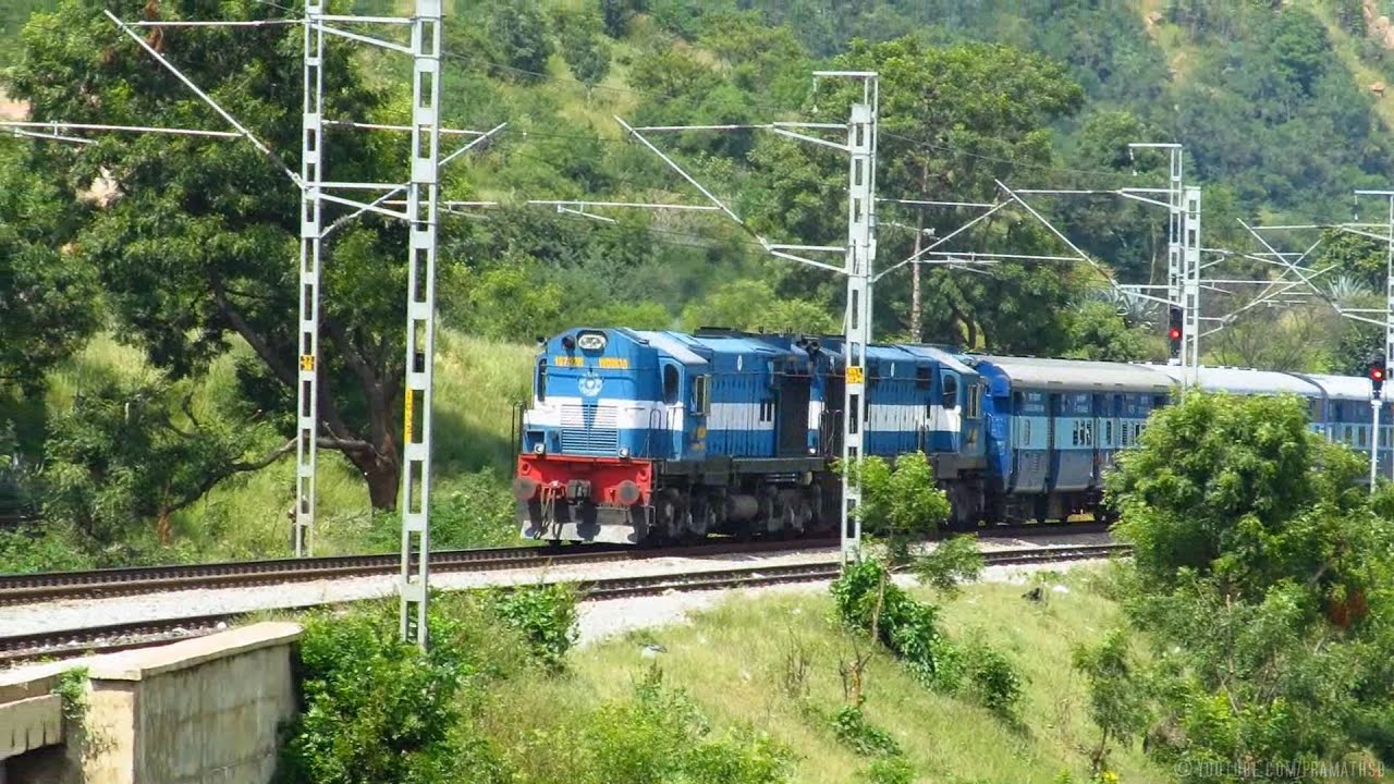 Blue train surrounded by Green: Karnataka Express at Makalidurga - YouTube