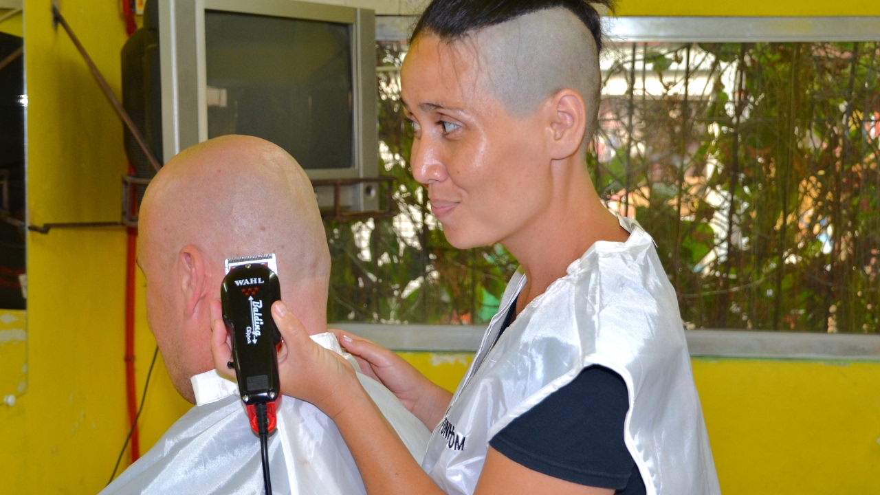 Undershaved barber girl in action - YouTube