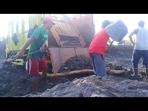 miners dredge sand and separate small rocks from sand material - andhry ...
