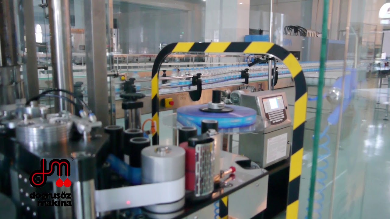 Rotary Roll-Fed Labelling Machine - YouTube