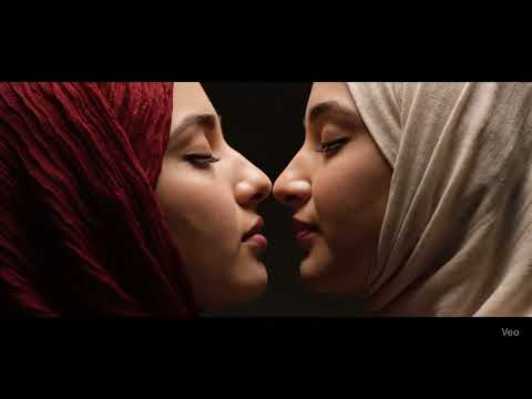 Two American Hijabi Women in Love Kiss – A Beautiful and Tender Connection
