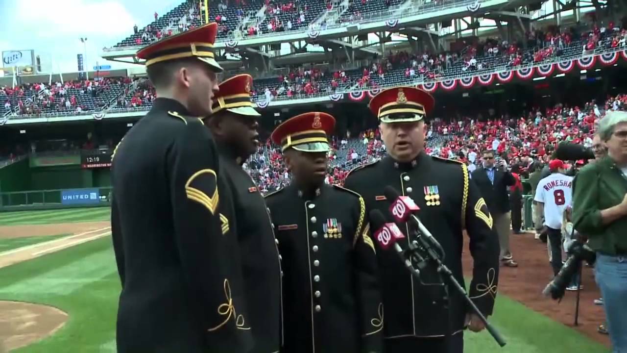 Medal of Honor recipient Staff Sgt. Clint Romesha throws first pitch ...