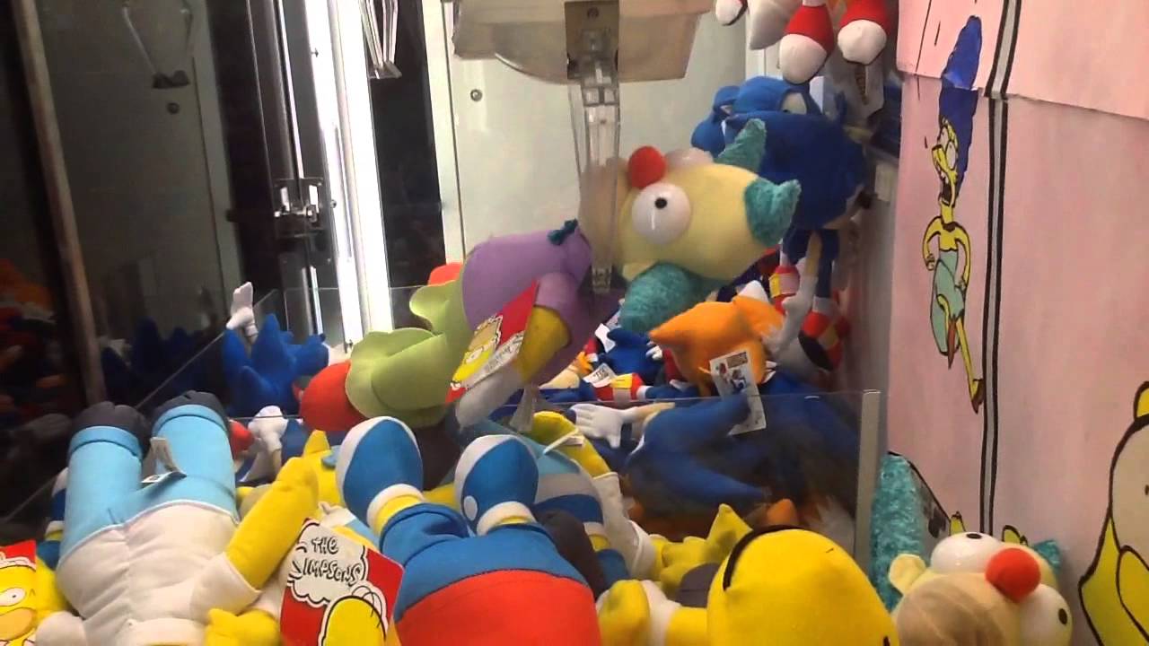 UFO catcher claw machine wins!!!! two 2 in 1's - YouTube
