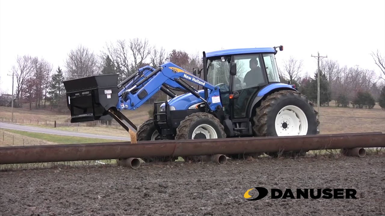 Danuser Auger Bucket Feeding Cows - YouTube