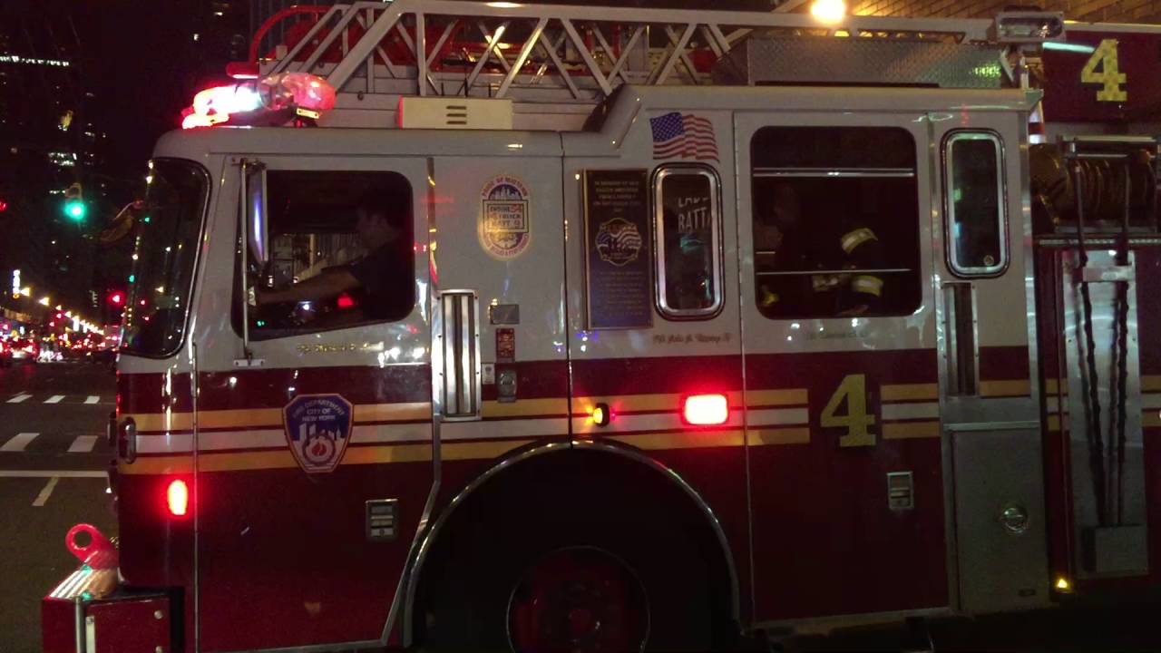 FDNY LADDER 4 RESPONDING FROM QUARTERS ON 8TH AVENUE IN MIDTOWN AREA OF ...