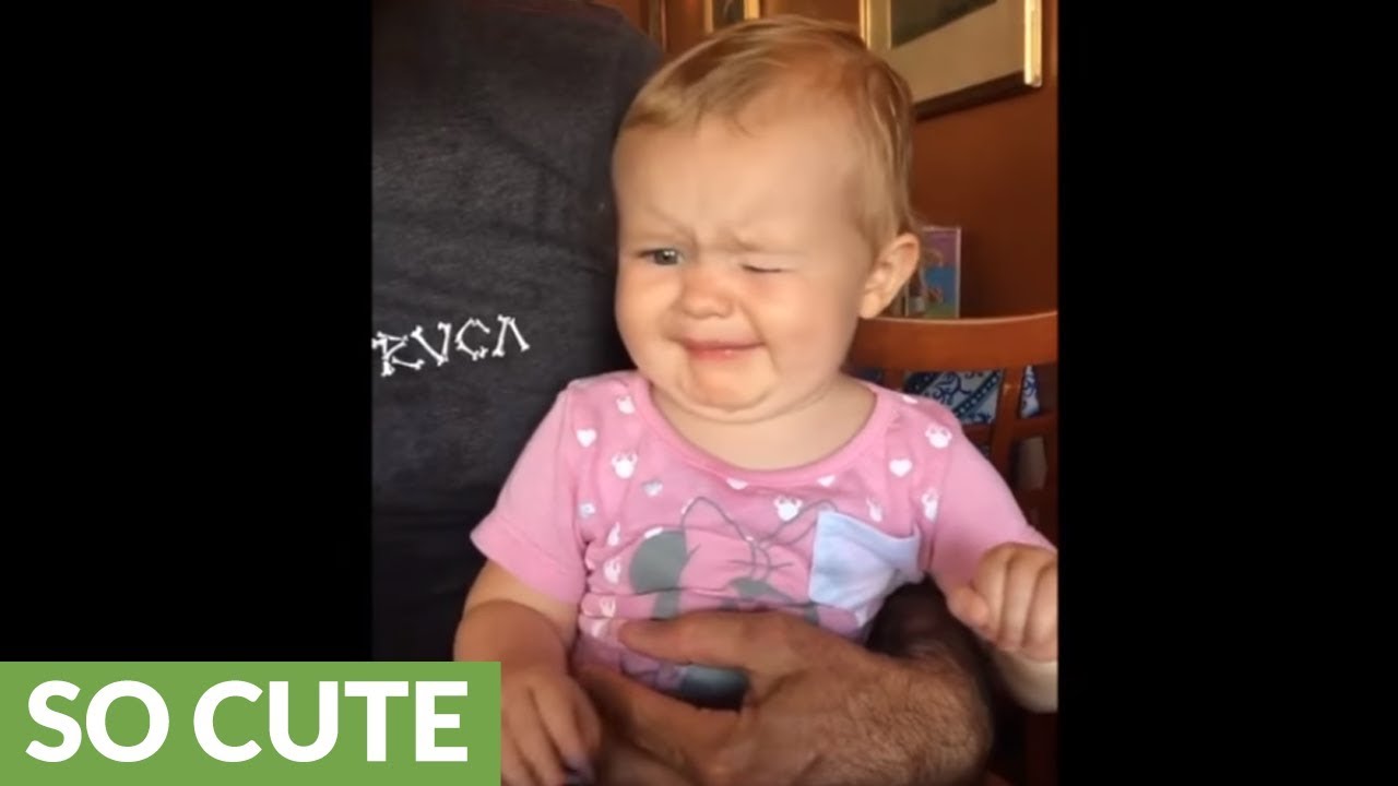 Baby makes hysterical face after tasting lemon - YouTube