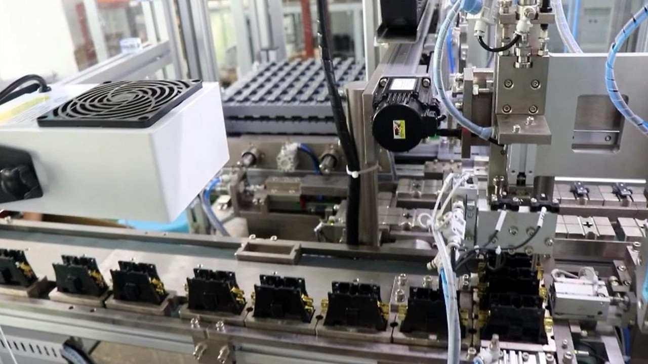 Contactors automatic assembly line - YouTube