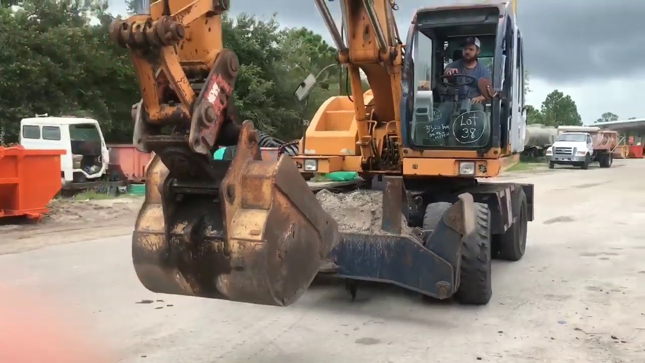 Samsung SE130W-2 Wheel Mounted EXCAVATOR 30,000 lb - YouTube