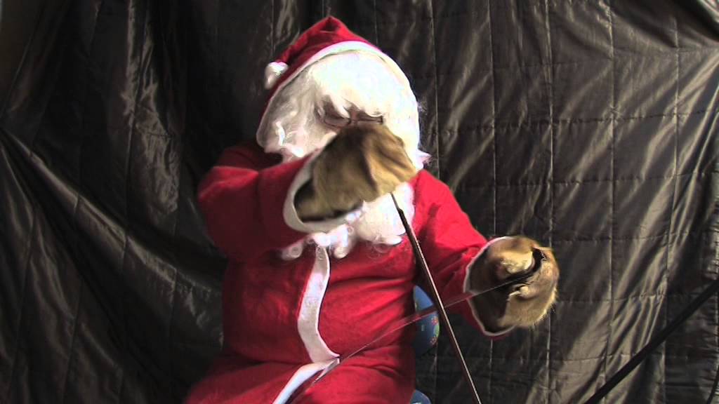 Santa Claus with a musical saw - YouTube