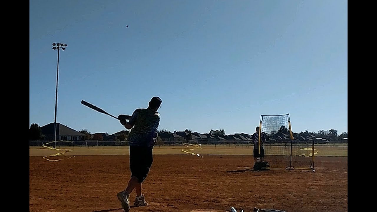 SOFTBALL HITTING STRAIGHT INTO 30MPH WINDS - YouTube
