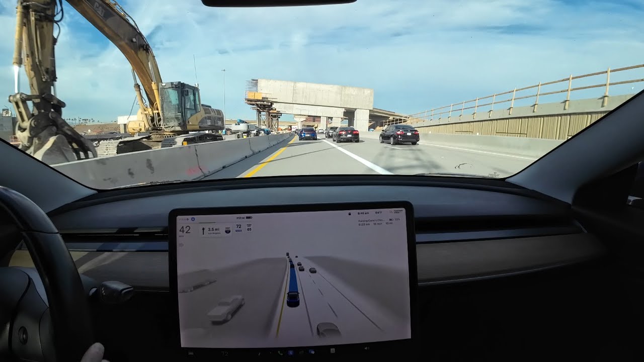 Tesla FSD 11.4.7.3 drives through I-10 construction - YouTube