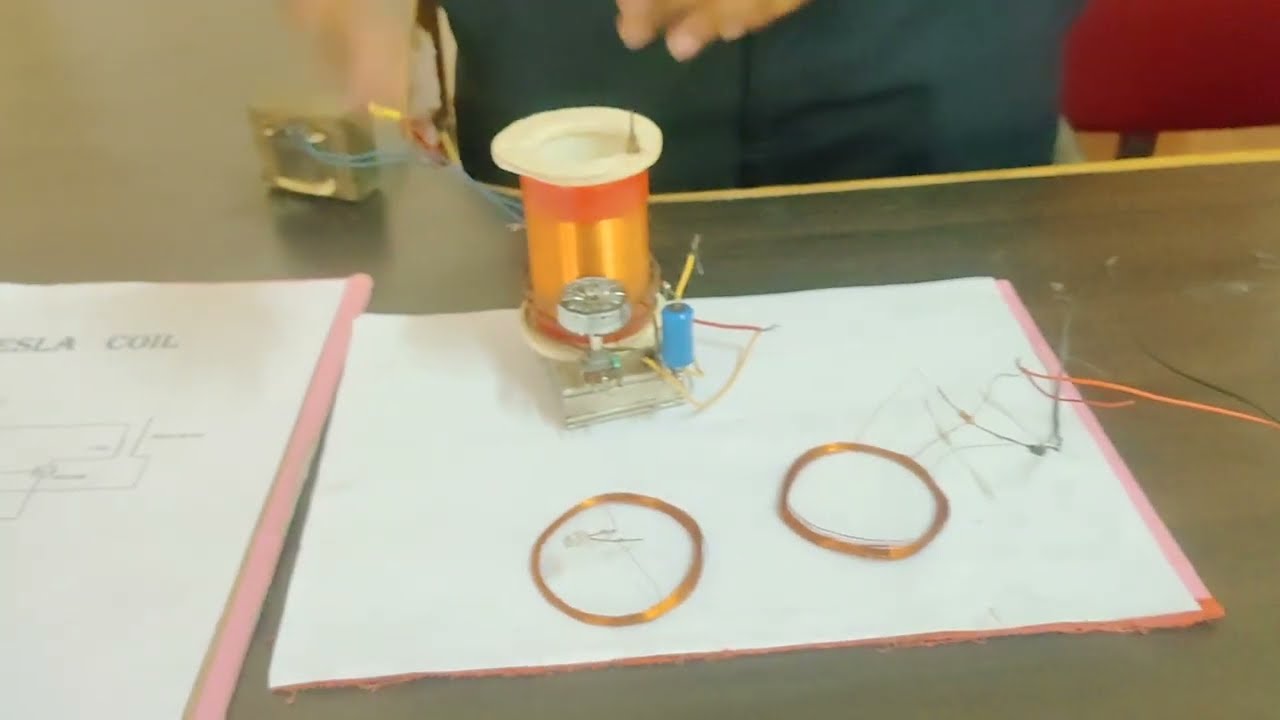 Tesla coil project works on electro magnetic coil principle,by polayya ...