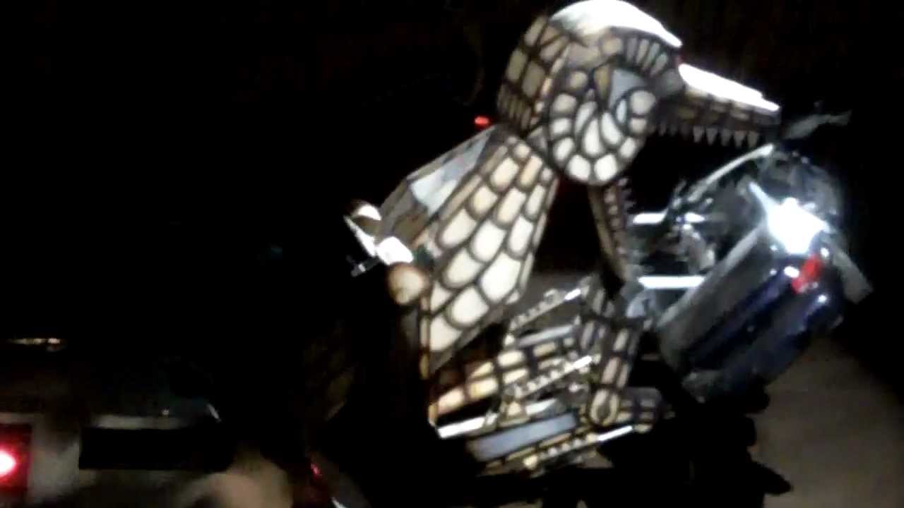 Megasaurus Eating Car Milwaukee 2013 - YouTube