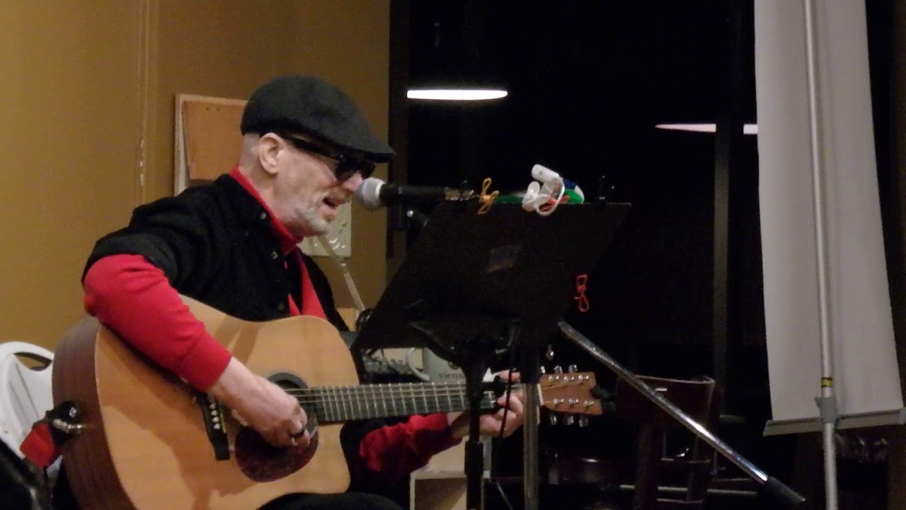 Terry Phillips plays one of his original songs at the Vienna Coffee ...