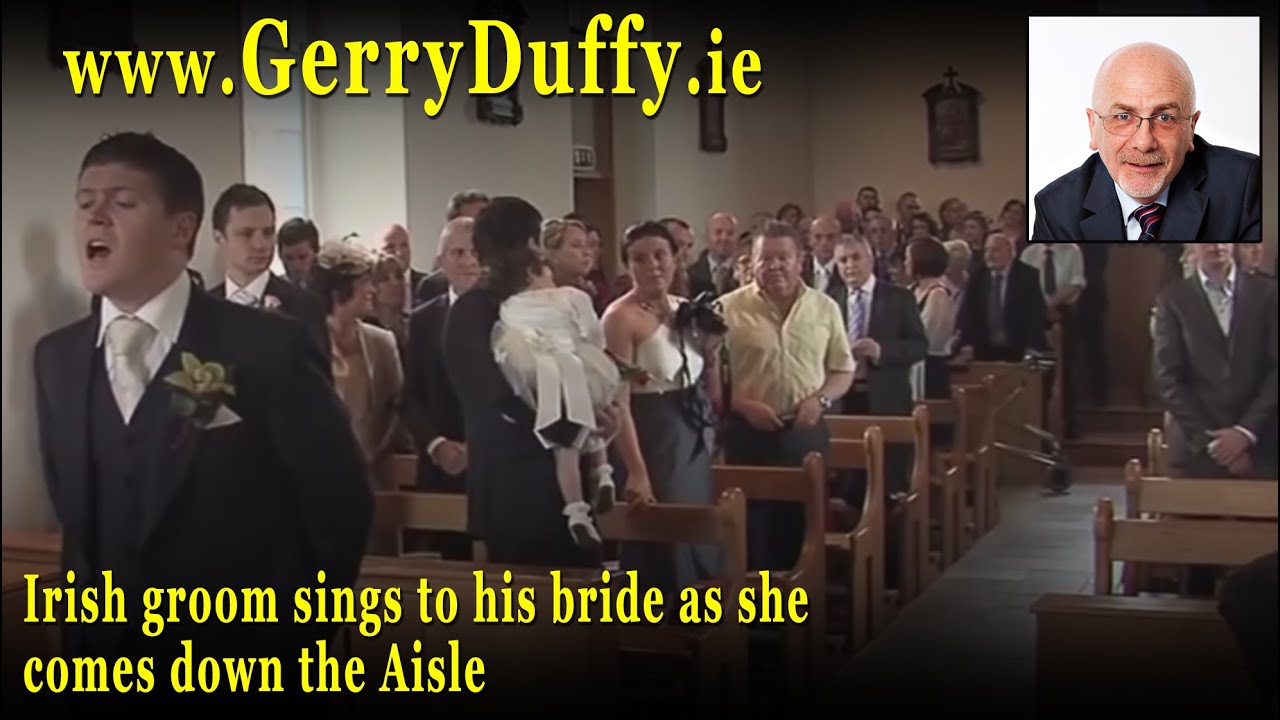 Irish groom sings to his bride as she comes down the Aisle st their ...