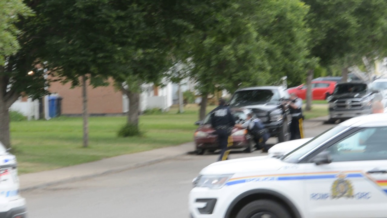 Police surround house - YouTube