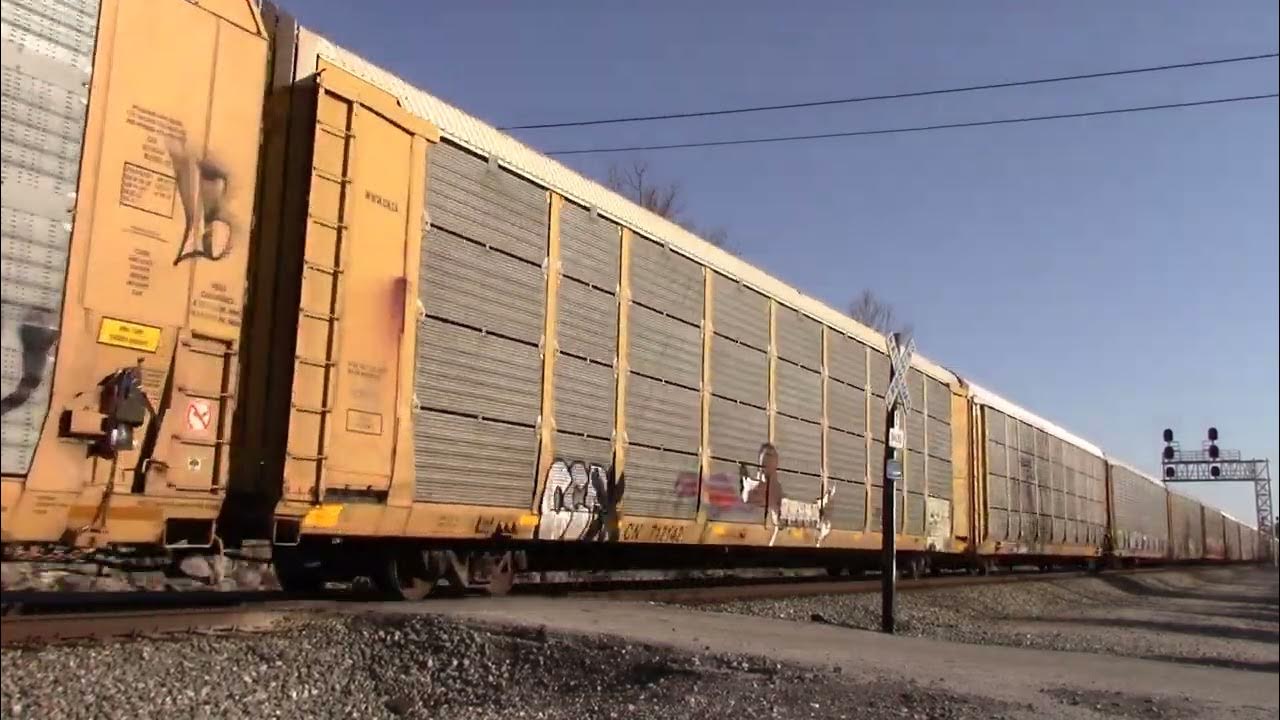 BNSF #6941 leads NS 188 through Tateville, KY - YouTube
