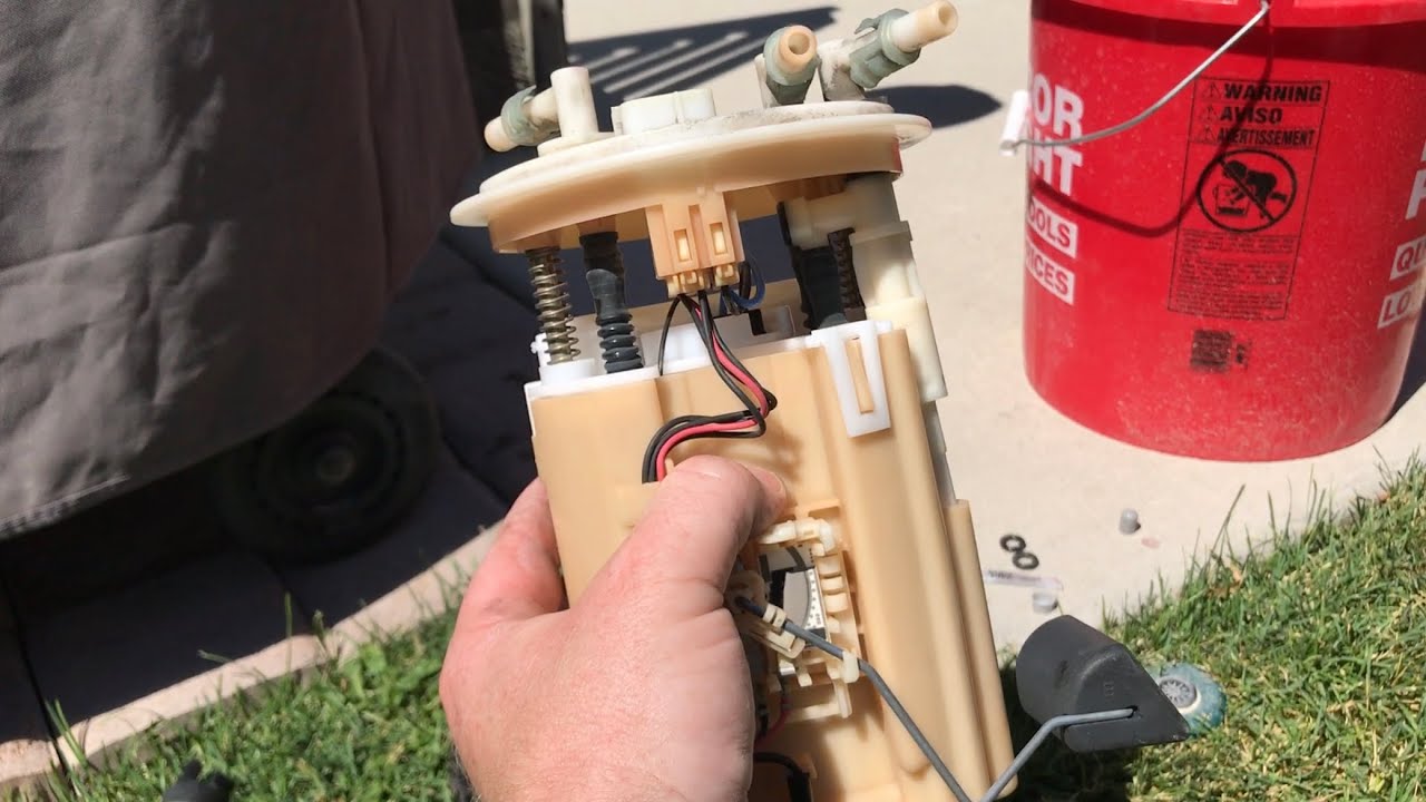 Replace your Fuel filter and pump on your Subaru Legacy GT - YouTube