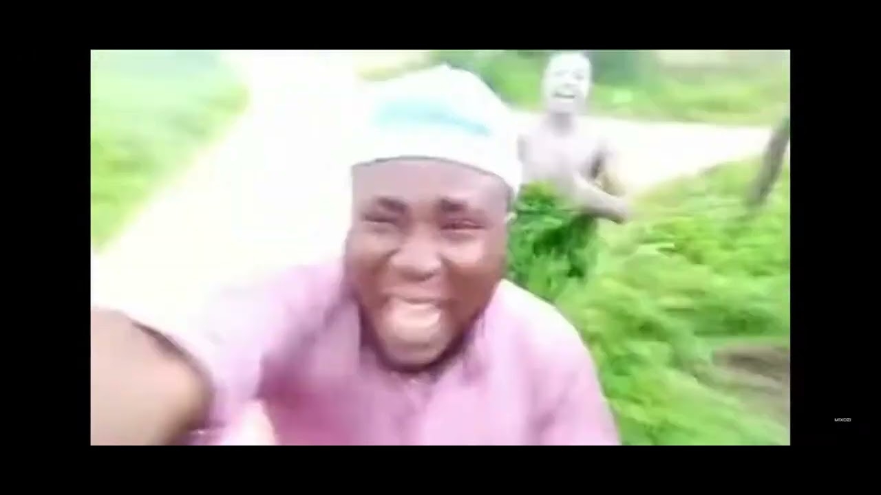 African guy running from a tribe member with seek Chase sound - YouTube