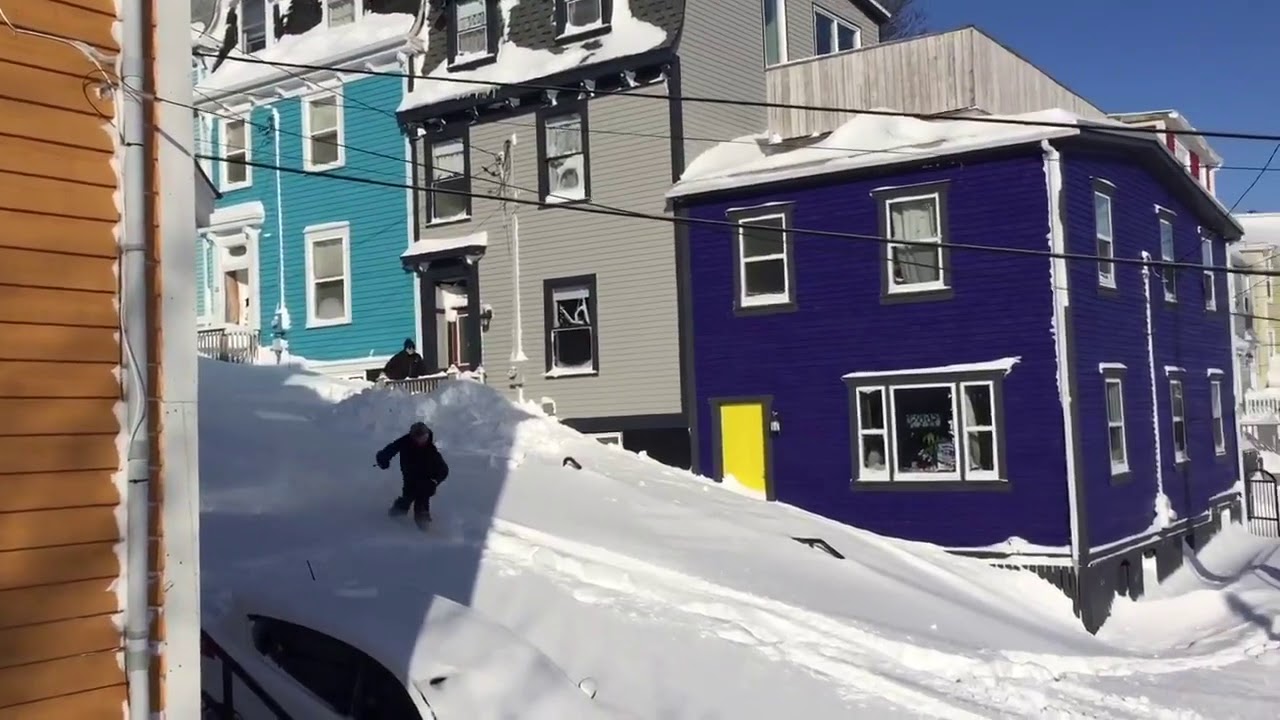 Canadians Snowboard Down the Streets of St Johns After a Snowstorm ...