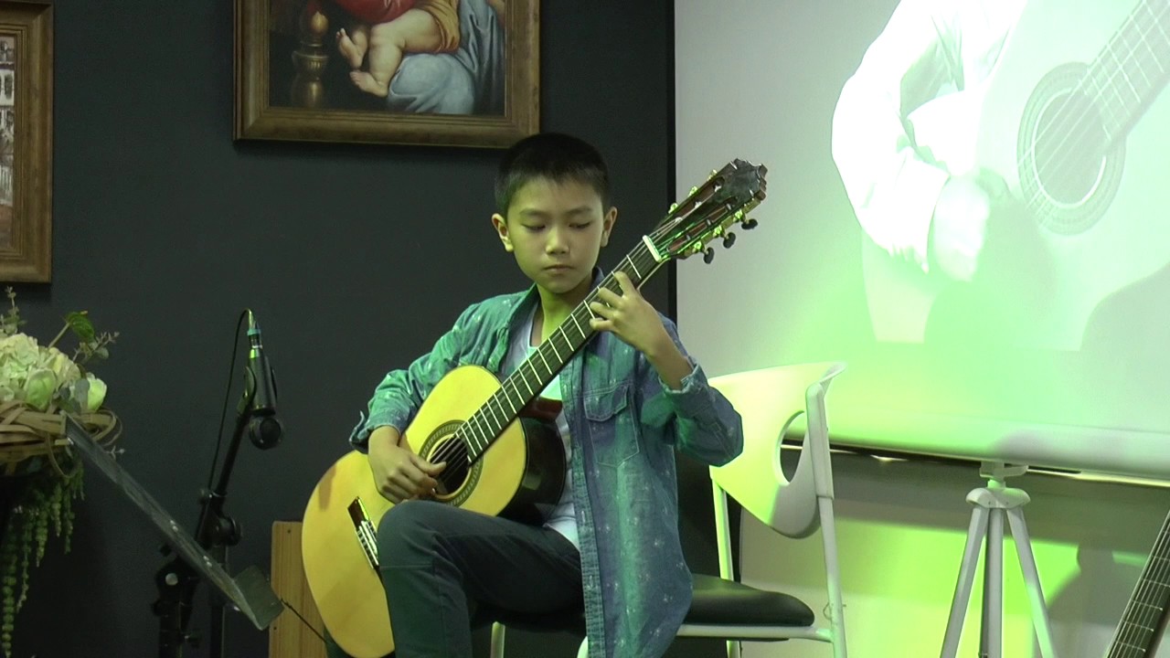 9 year old Junhao Liu plays Recuerdos del Alhambra by Tarrega - YouTube