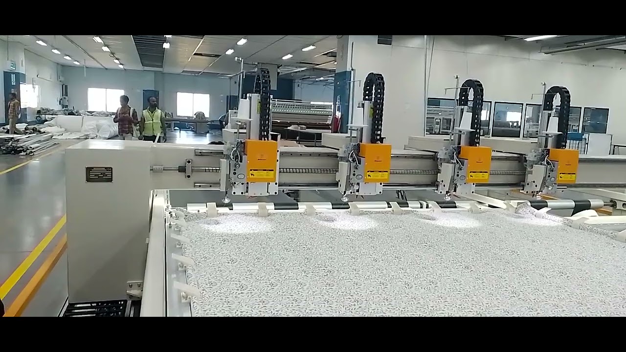 Richpeace four head quilting machine .automatic head up and down. - YouTube