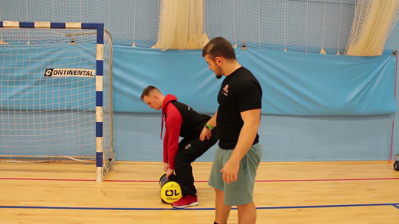 Overhead Sandbag Throw - YouTube