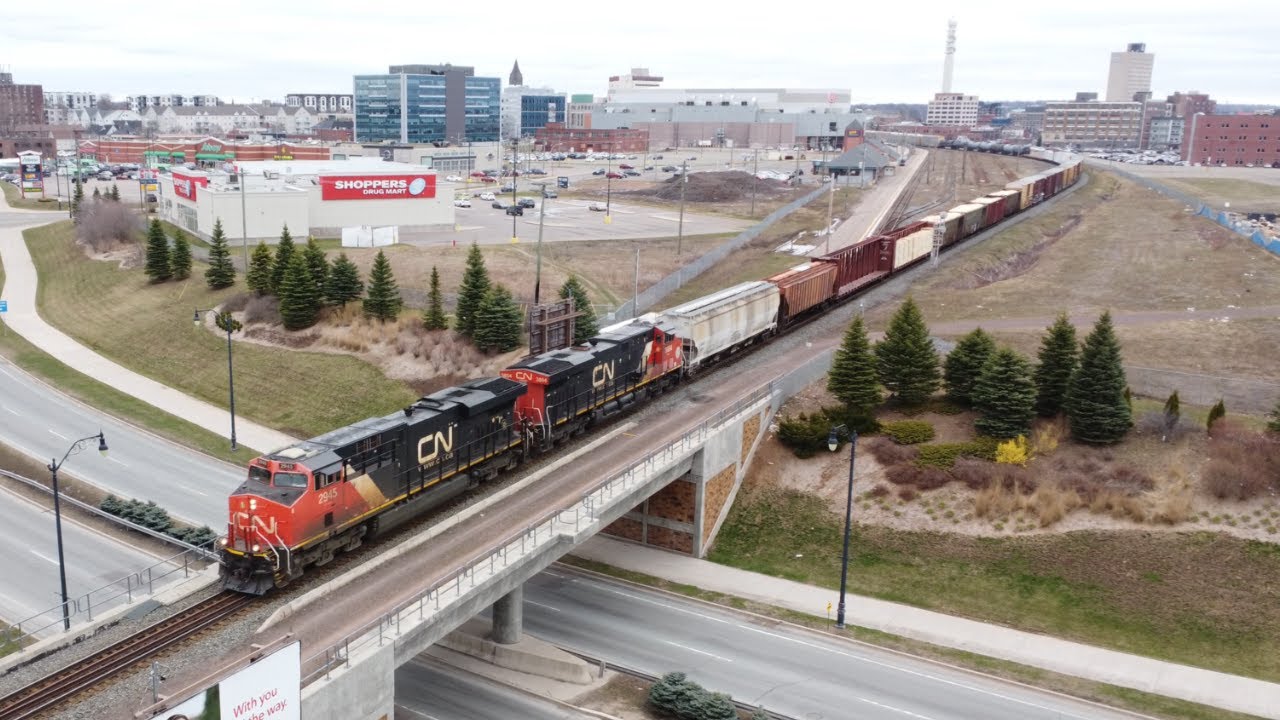 Nice Aerial View in 4K! Long Manifest Train CN 507 Rolling thru Moncton ...