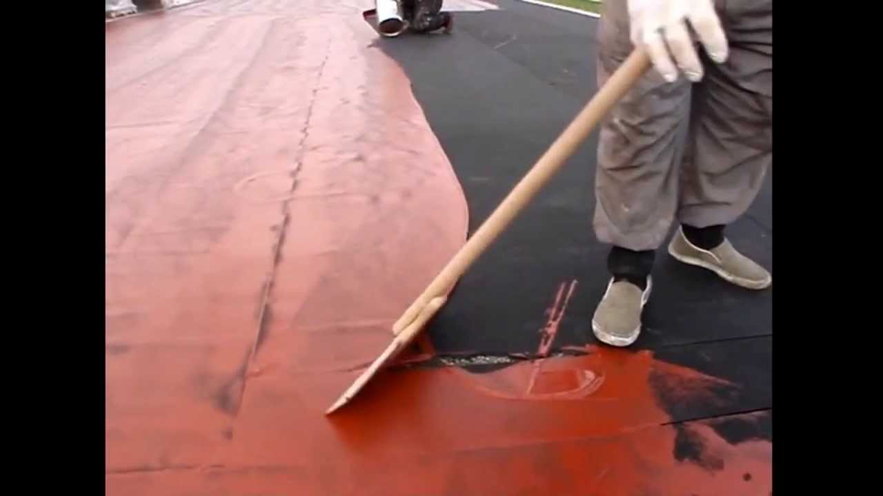 The Ridge Athletic Track- EPI Sports installation red sealer - YouTube